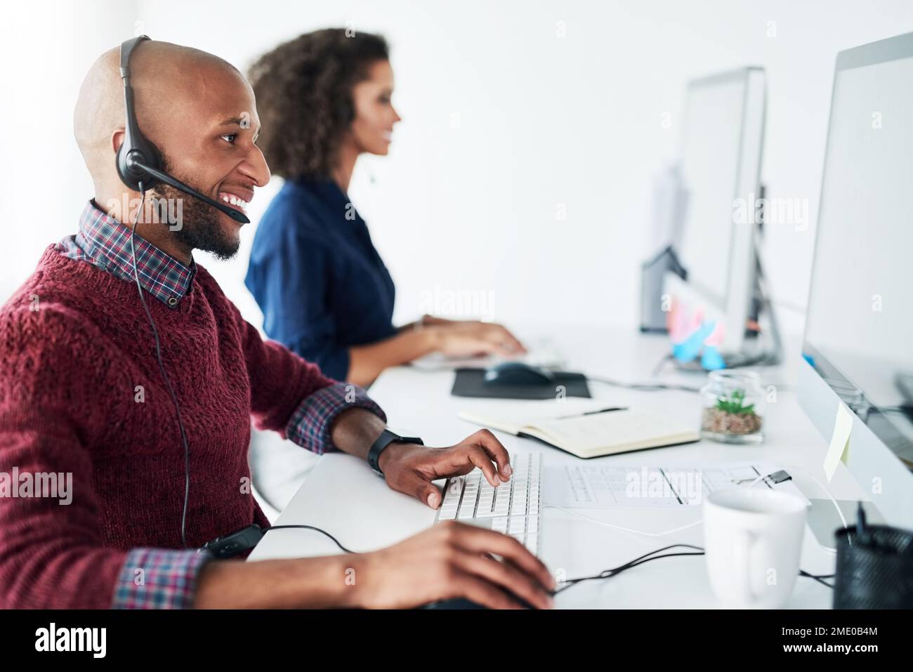 Two focused male call center hi-res stock photography and images - Alamy