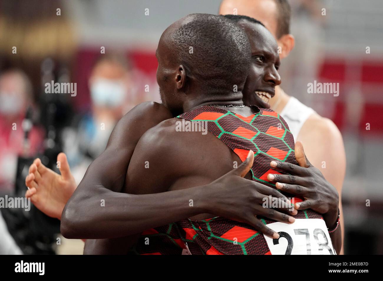 Emmanuel Korir, right, of Kenya, embraces compatriot Ferguson Rotich ...