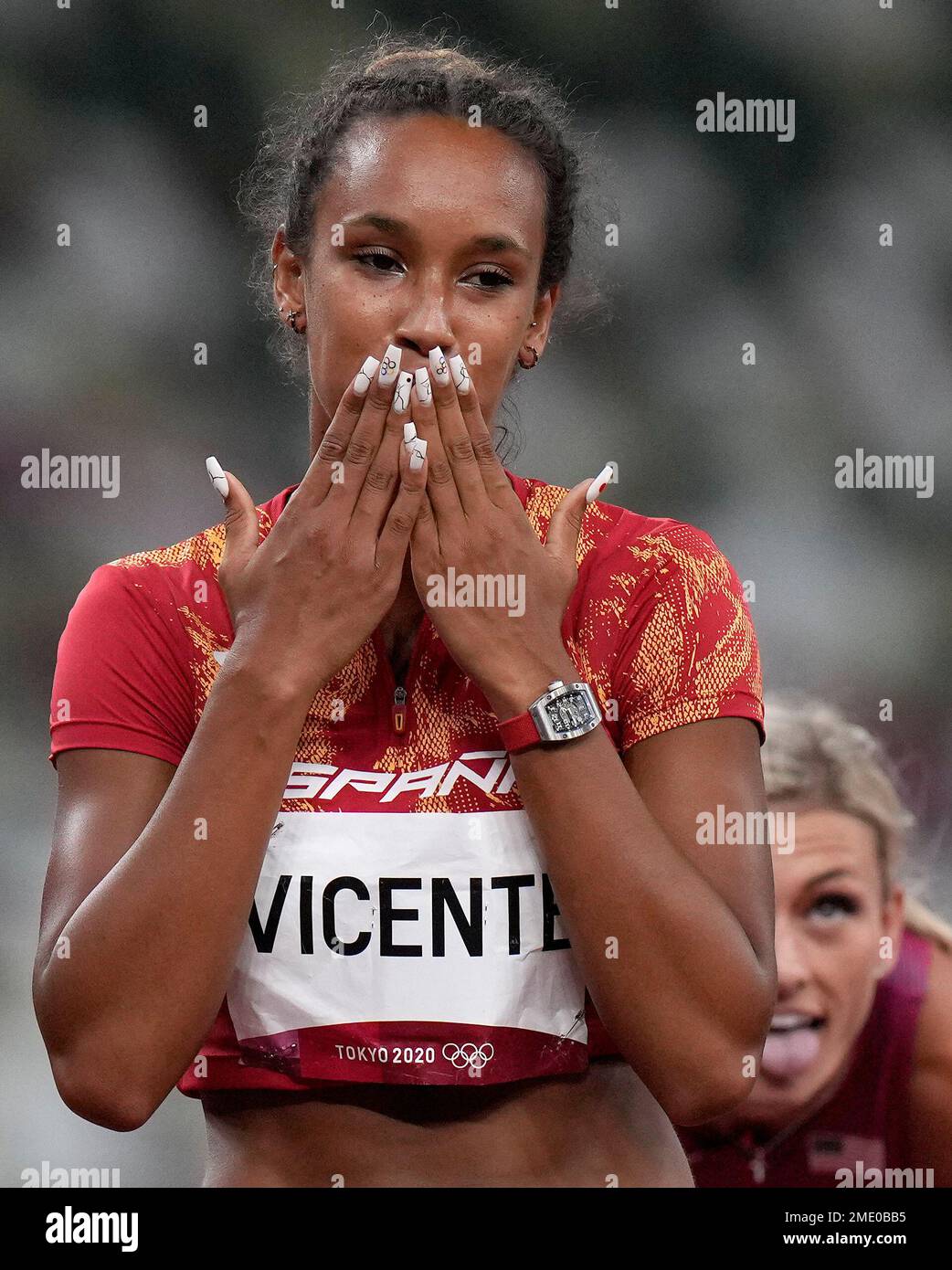 Maria Vicente, of Spain reacts after finishing the heptathlon 200 ...