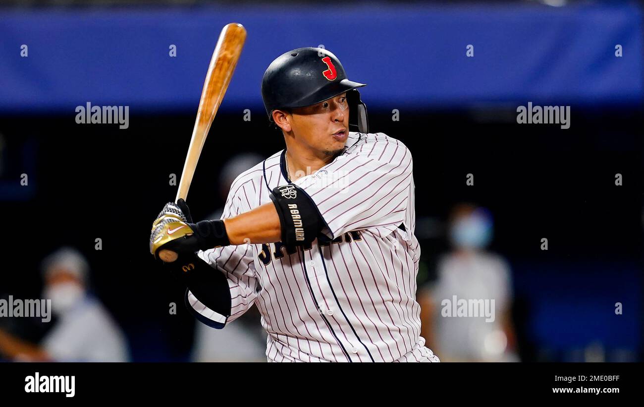 Japan's Hideto Asamura bats during a semi-final baseball game against ...