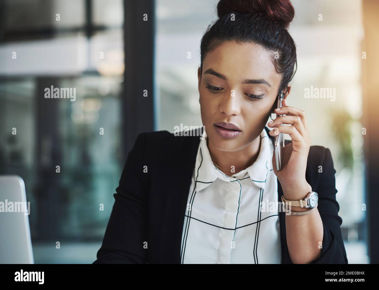 Can you email me those figures please. a young businesswoman using a ...