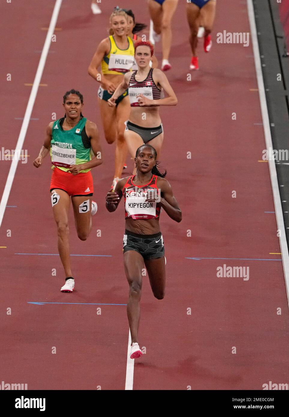 Faith Kipyegon, of Kenya races to win a women's 1,500-meter semifinal ...