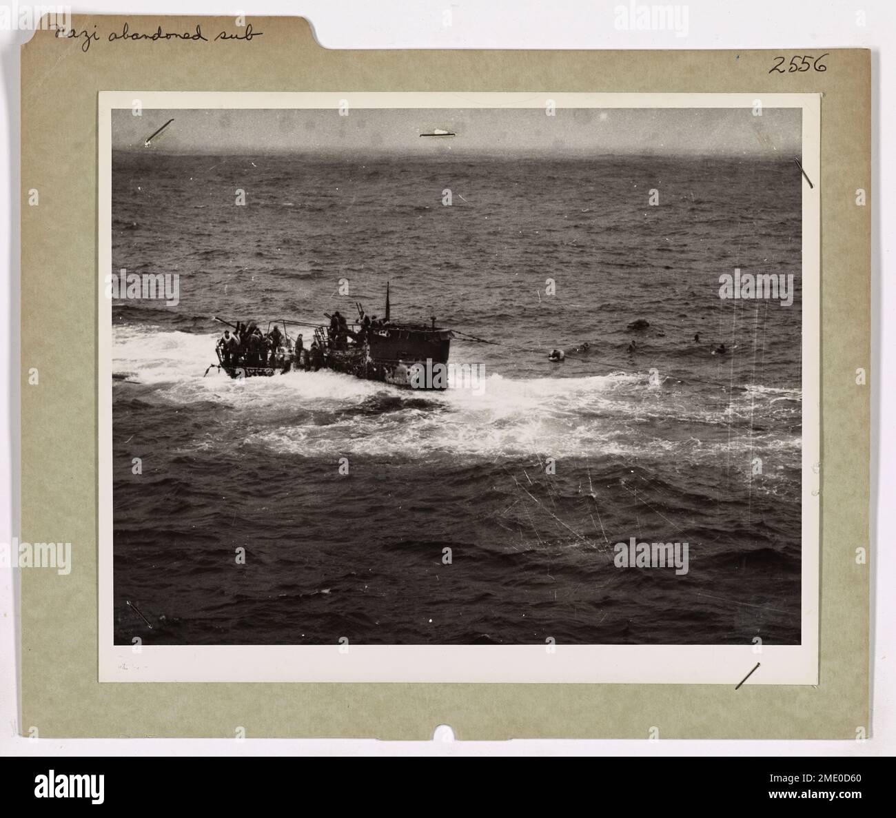 A German submarine, crippled by depth charges fired by U.S. Coast Guard ...