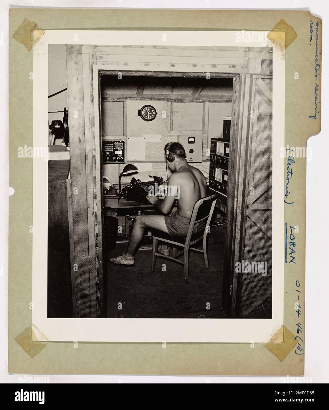 Inside a communications room, personnel monitor sensitive equipment ...