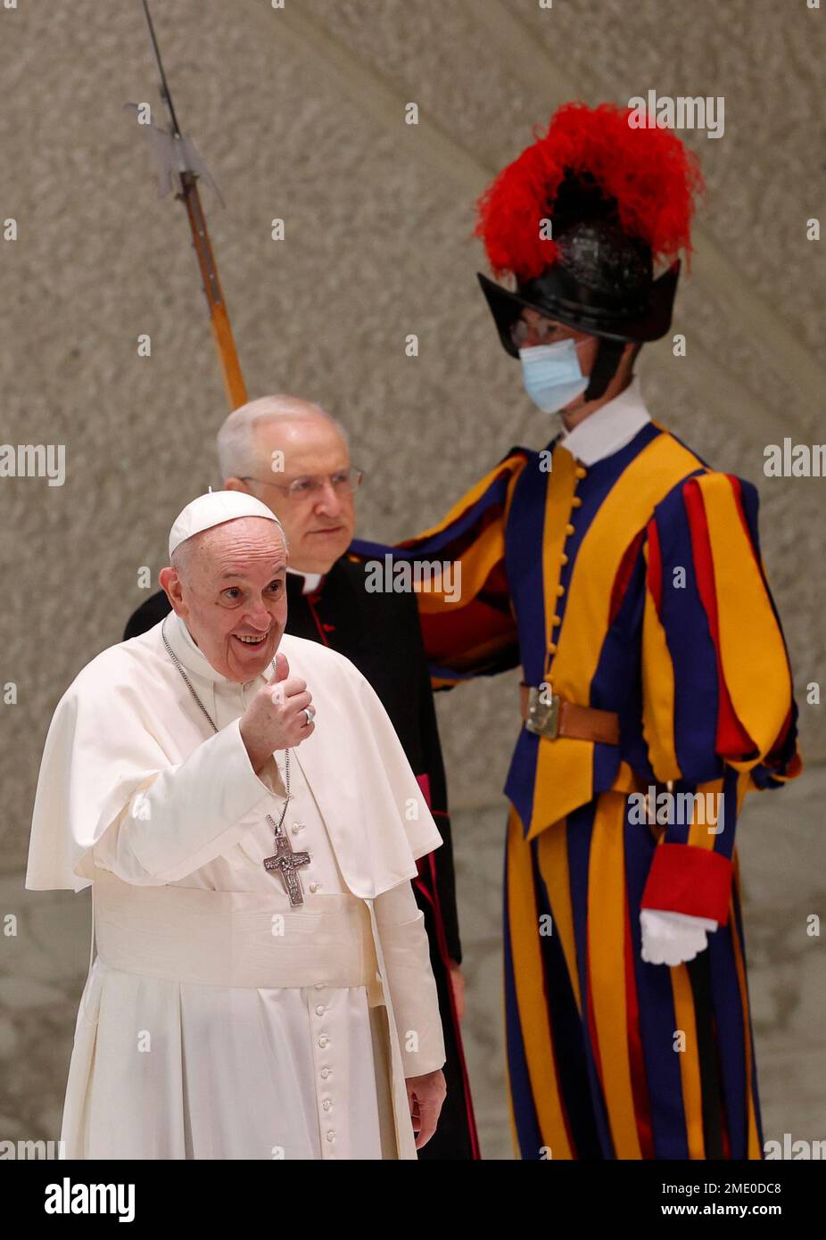 Pope Francis gives the thumb up sign as he arrives to attend his weekly ...