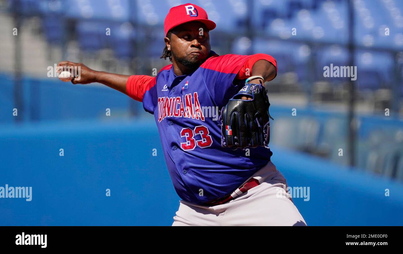 Dominican Republic's Jairo Asencio (33) pitches against the United ...