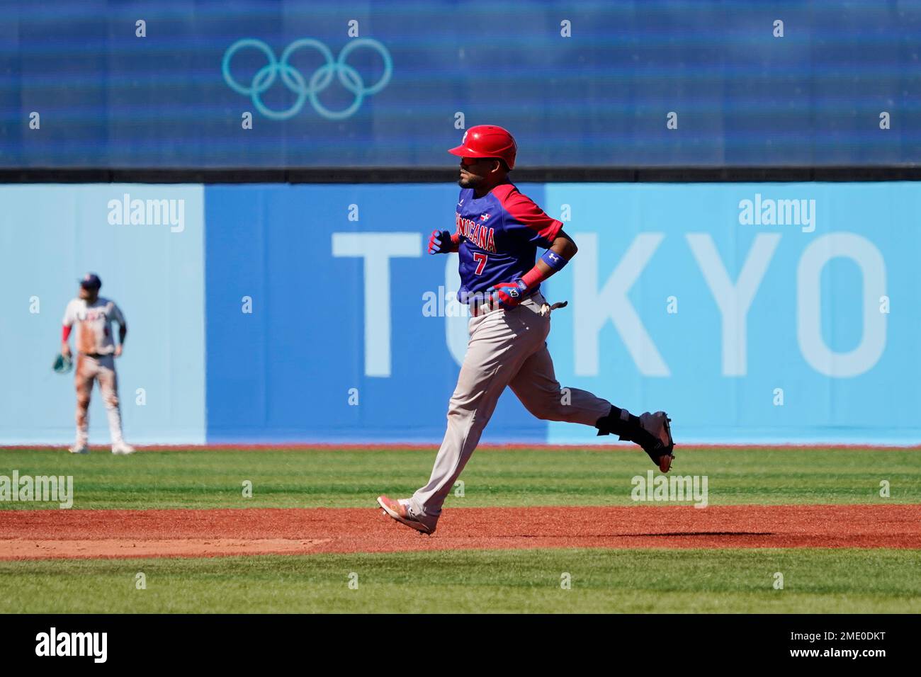 Dominican Republic's Charlie Valerio (7) runs around the bases with a ...