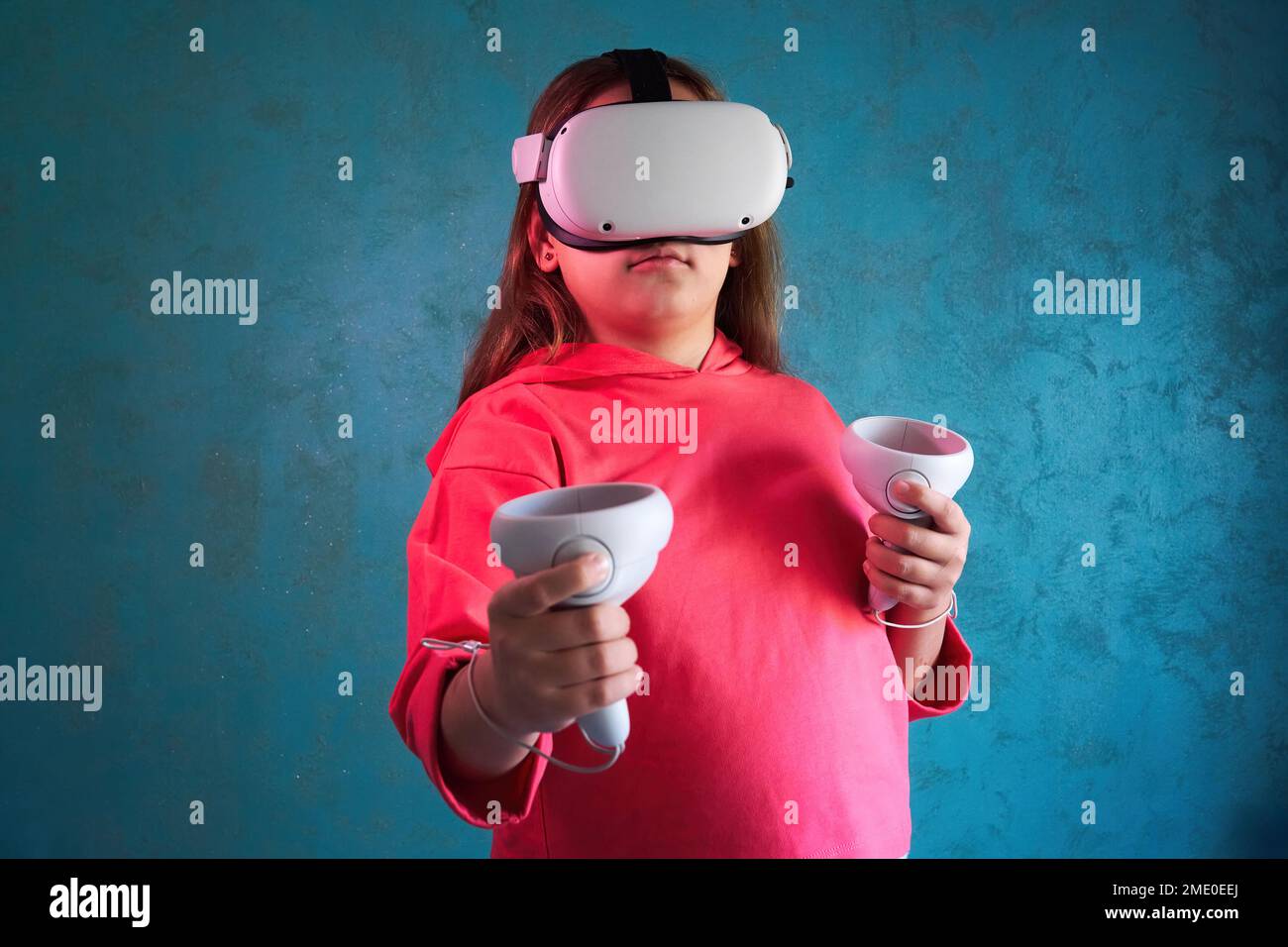 little girl playing with VR headset Stock Photo - Alamy