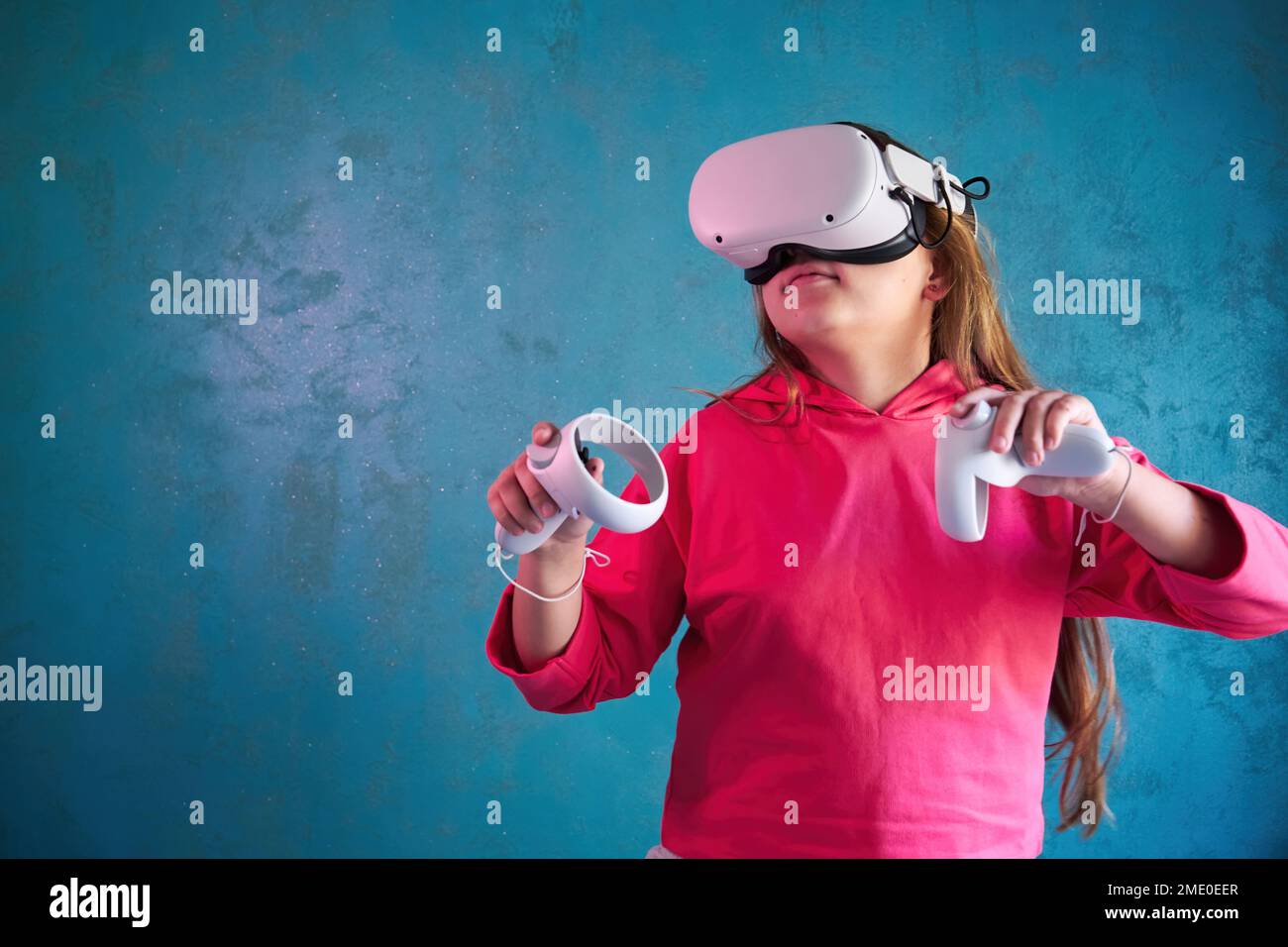 little girl playing with VR headset Stock Photo - Alamy
