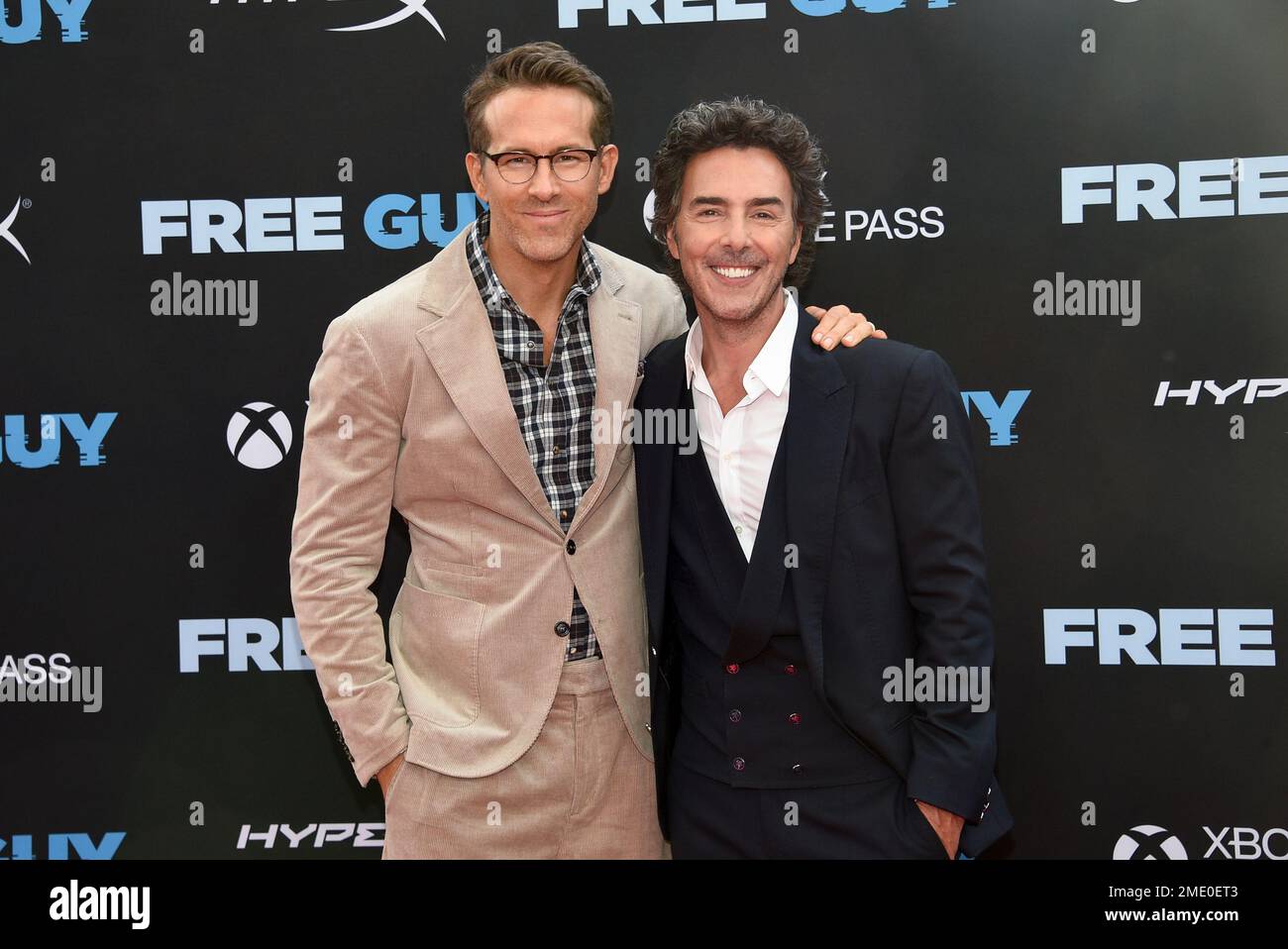Actor Ryan Reynolds, left, and director Shawn Levy pose together at the ...