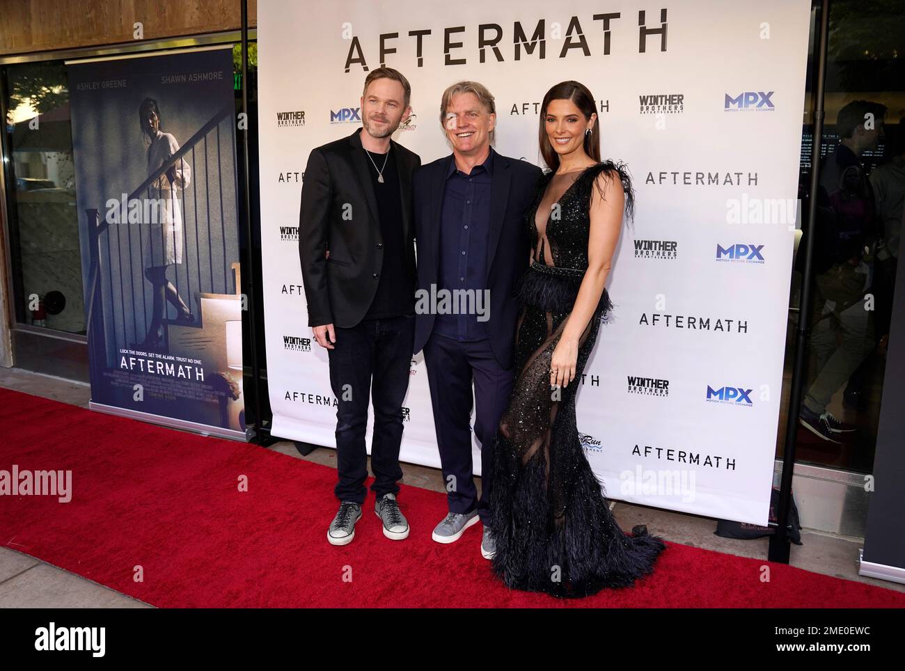 Peter Winther, center, director of "Aftermath," poses with cast members ...