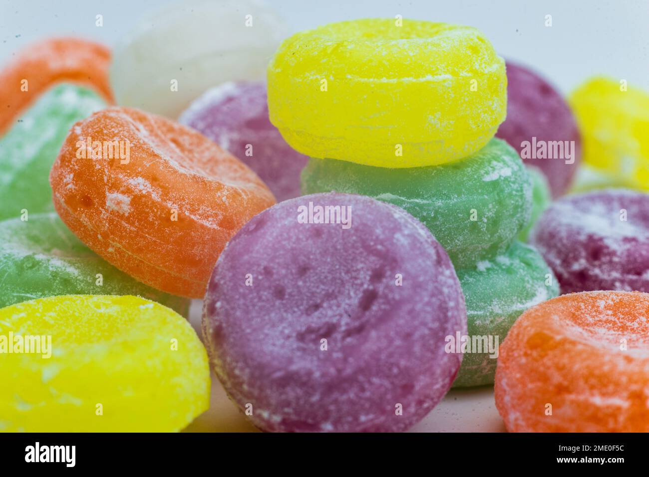 colorful sweet flavoured boiled sweets, candies, Candy on white, black ...