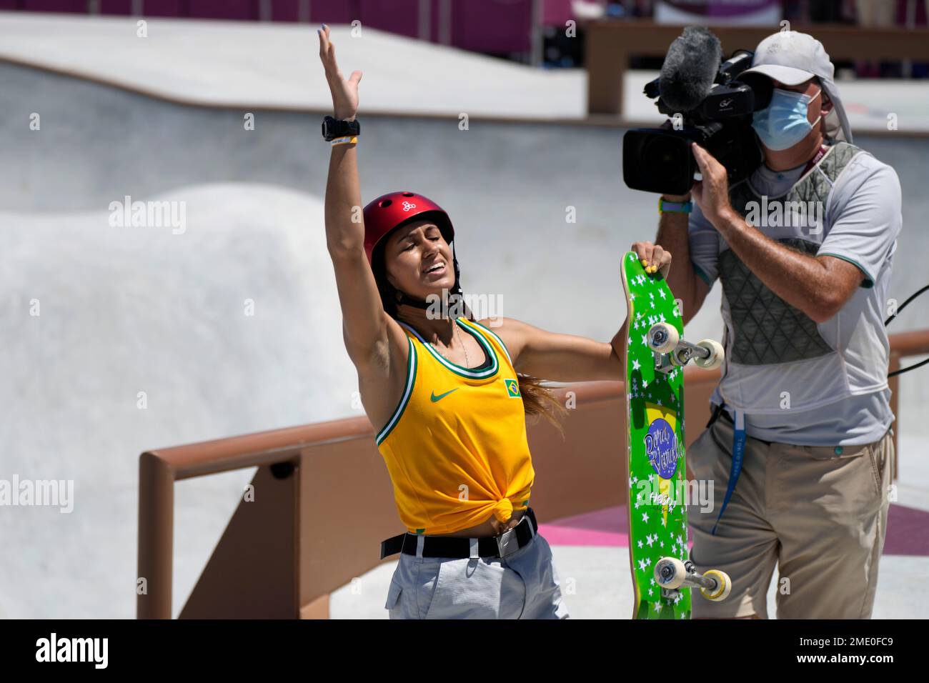 Dora Varella of Brazil celebrates her run in the women's park ...