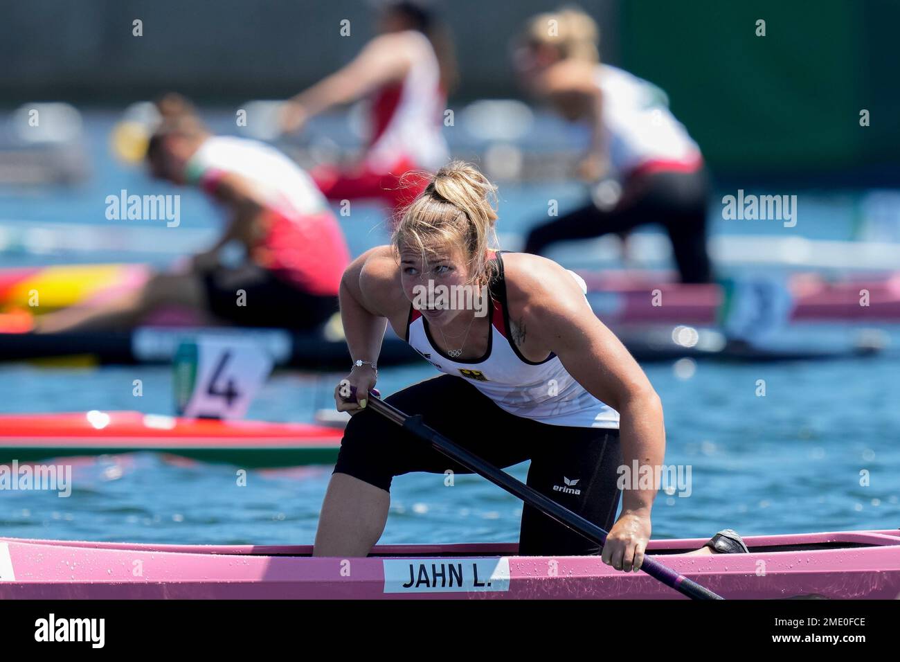 Lisa Jahn, of Germany, reacts after competing in the women's canoe ...