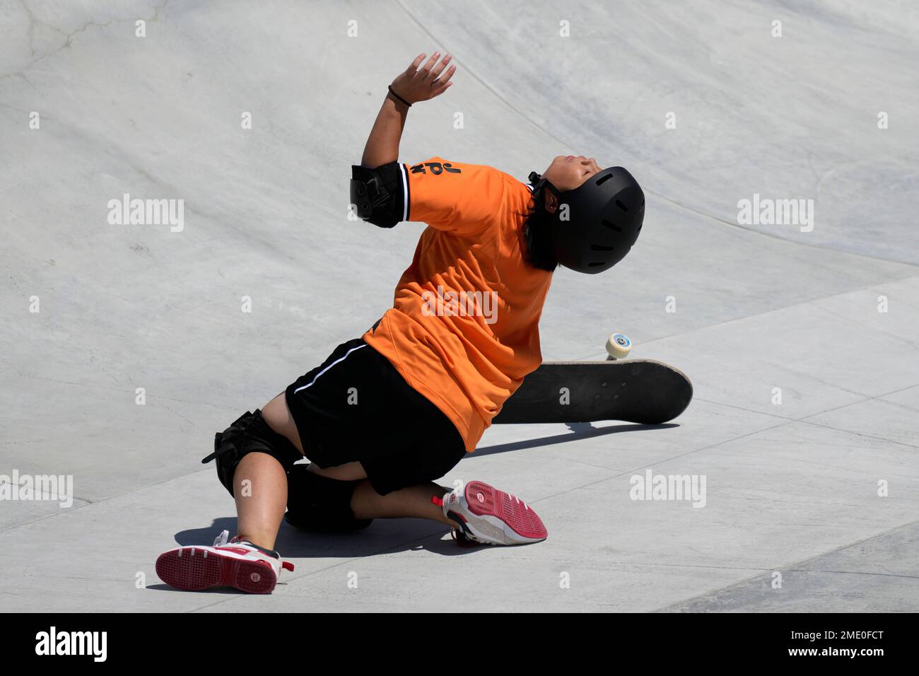 Misugu Okamoto of Japan reacts after falling during the women's park ...