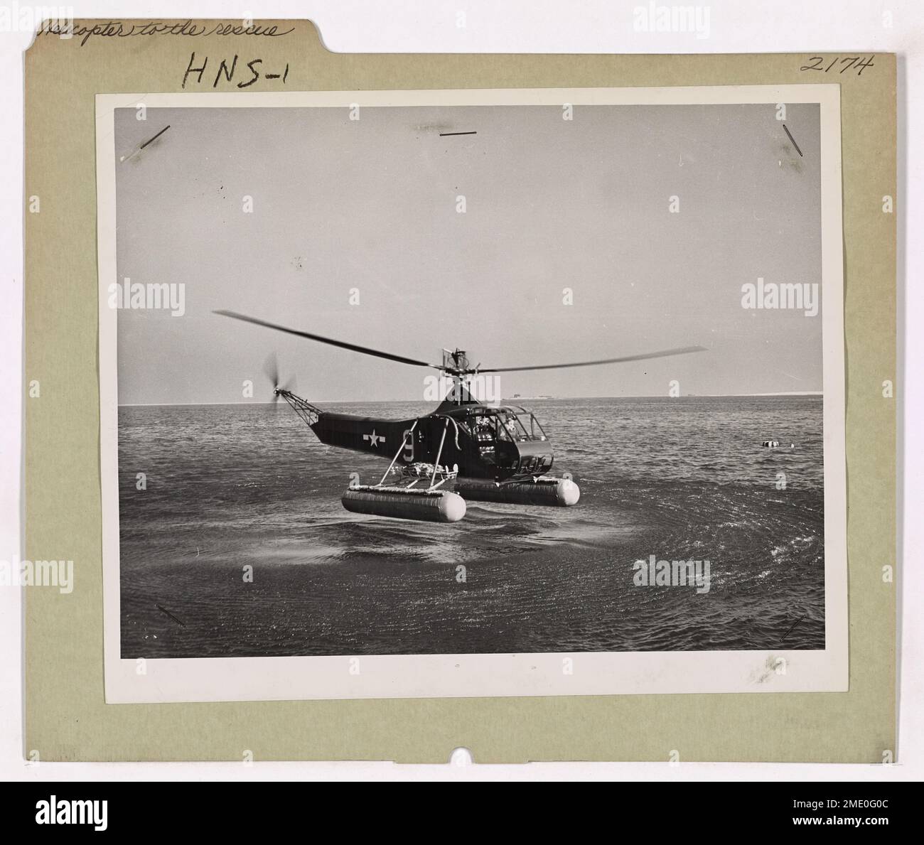 A Coast Guard helicopter demonstrates its sea rescue capability as it ...