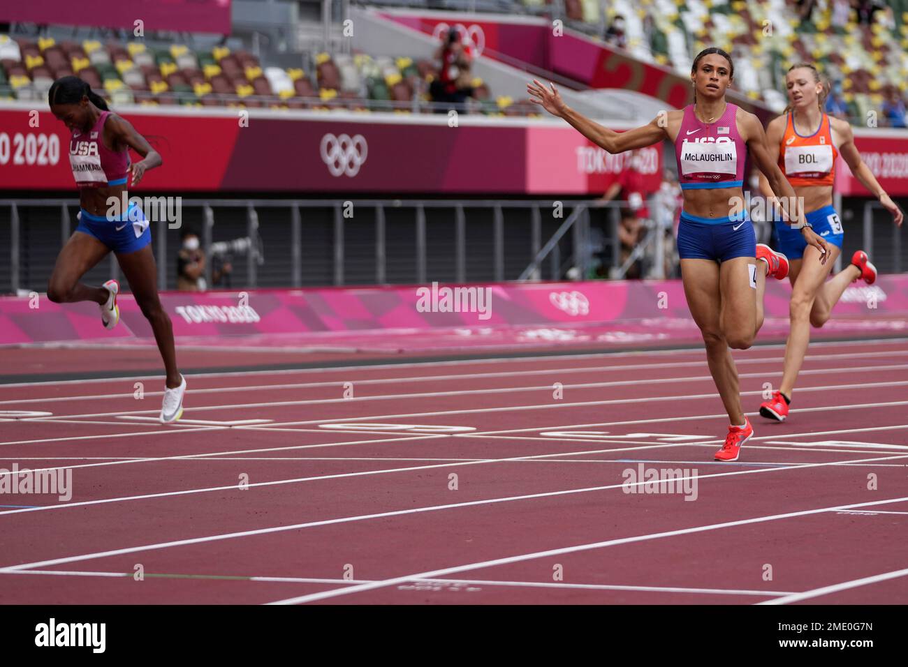 Sydney McLaughlin, second right, of United States, crosses the finish ...