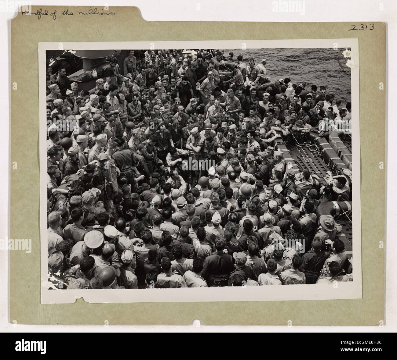 Aboard a Coast Guard-manned assault transport, American troops prepare ...