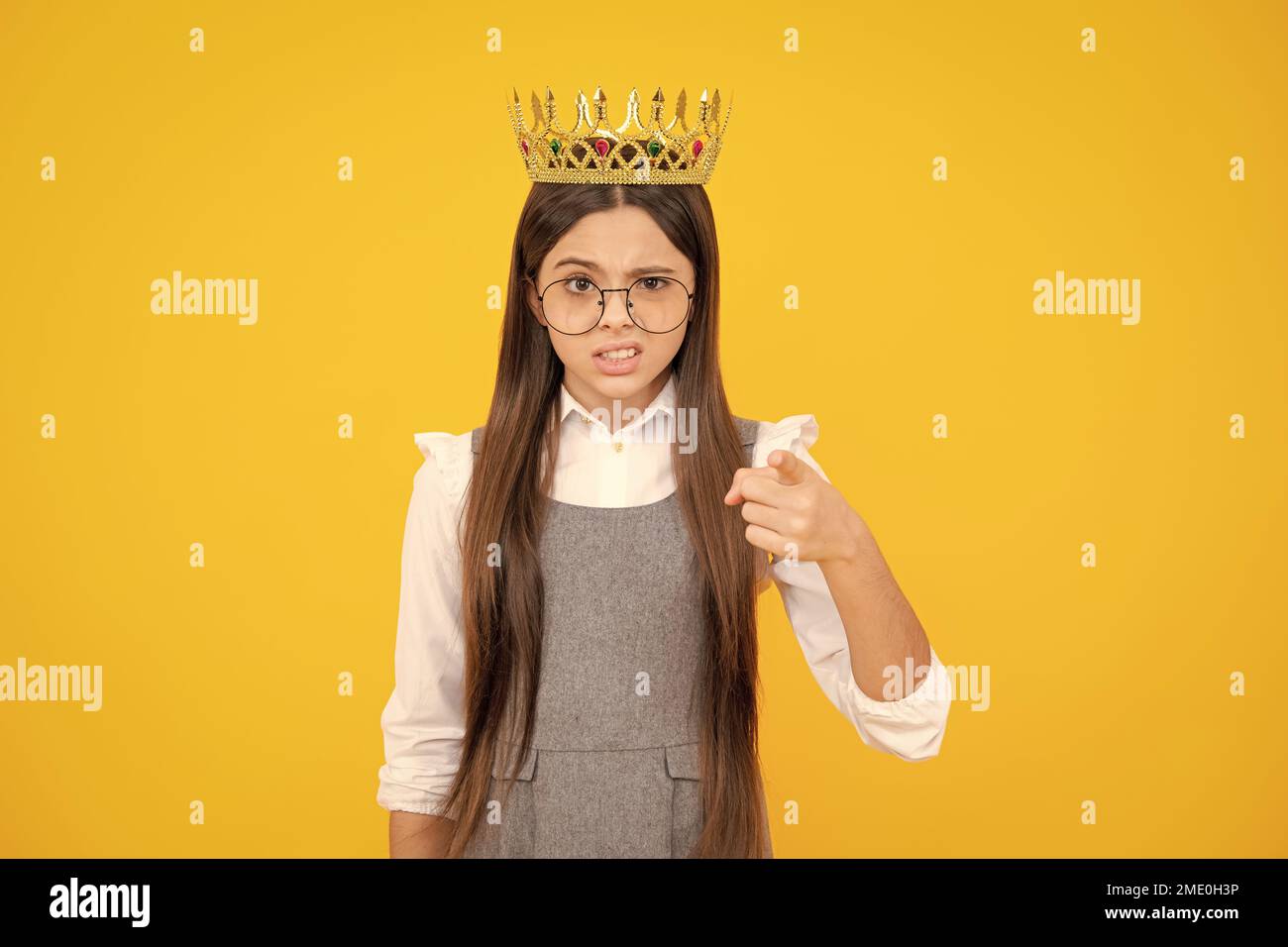 Girls birthday party, funny kid in crown. Imagine herself a queen ...