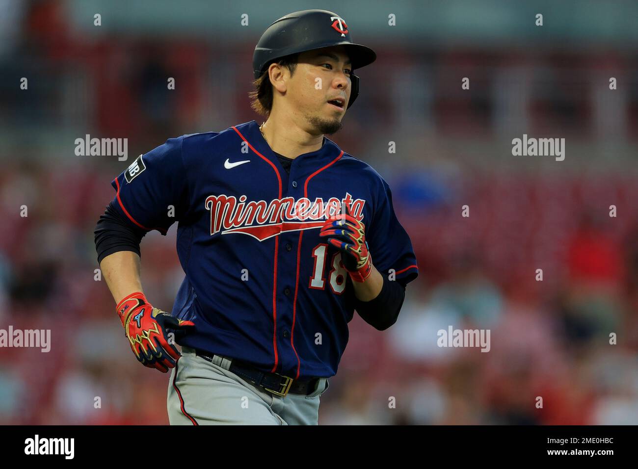 Minnesota Twins' Kenta Maeda runs to first base after hitting a single ...