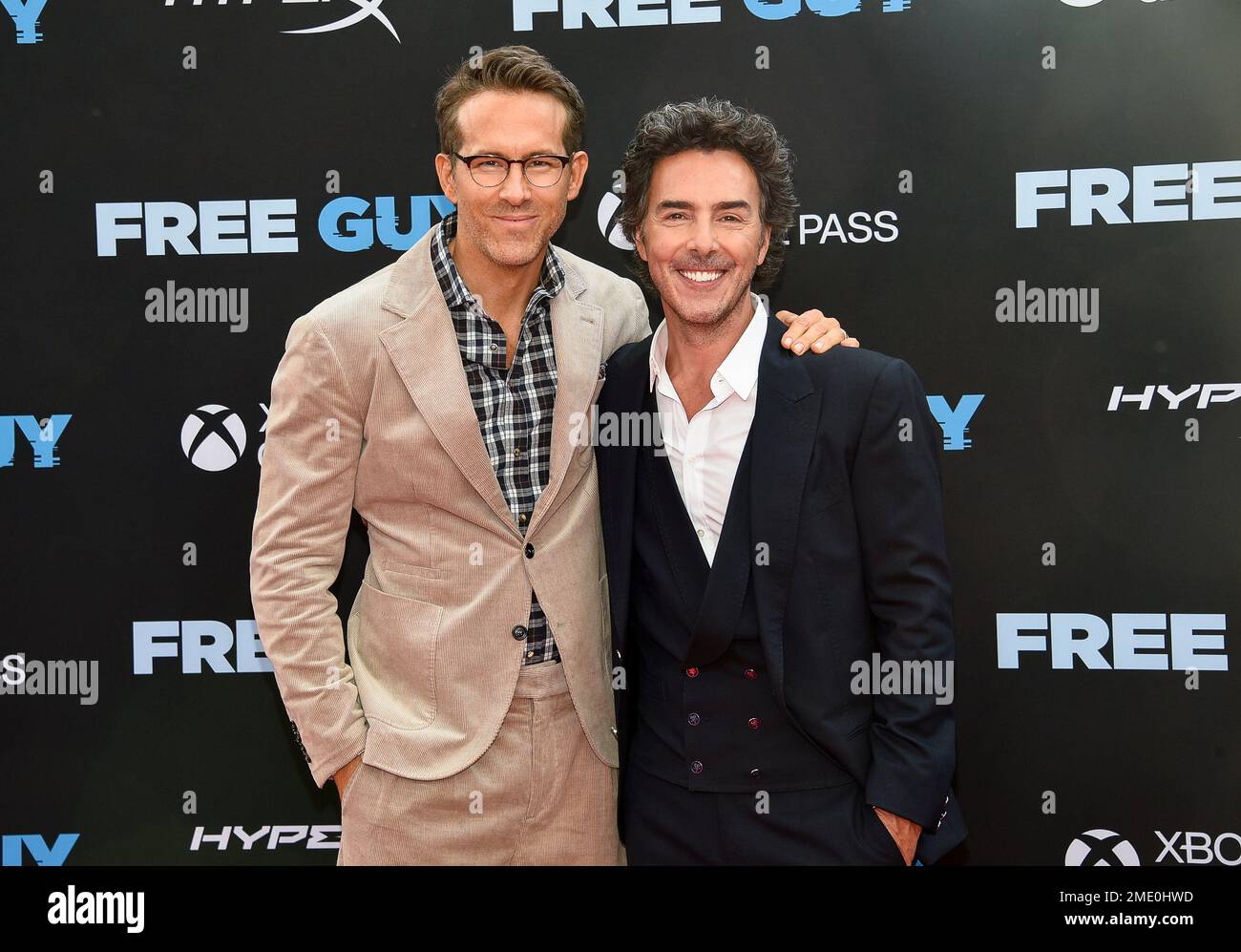 Actor Ryan Reynolds, left, and director Shawn Levy pose together at the world premiere of "Free ...
