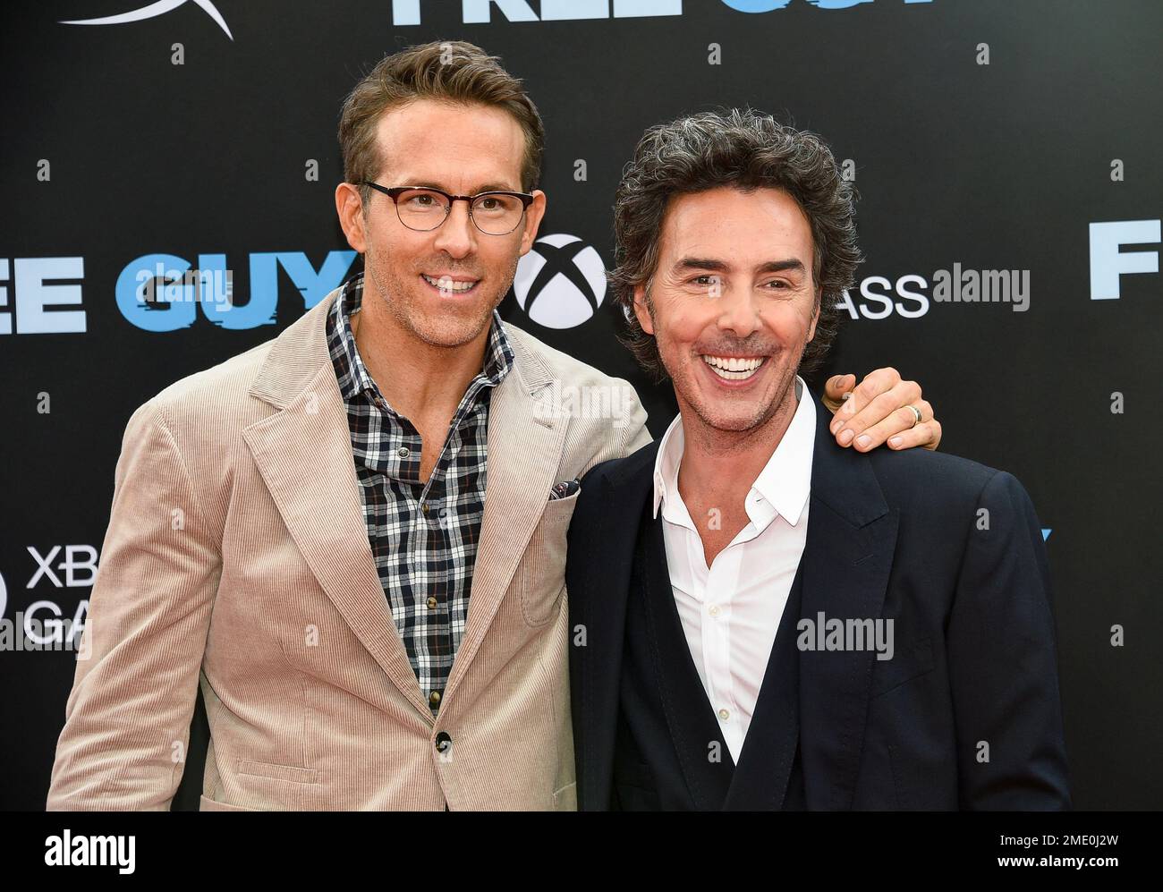 Actor Ryan Reynolds, left, and director Shawn Levy pose together at the ...