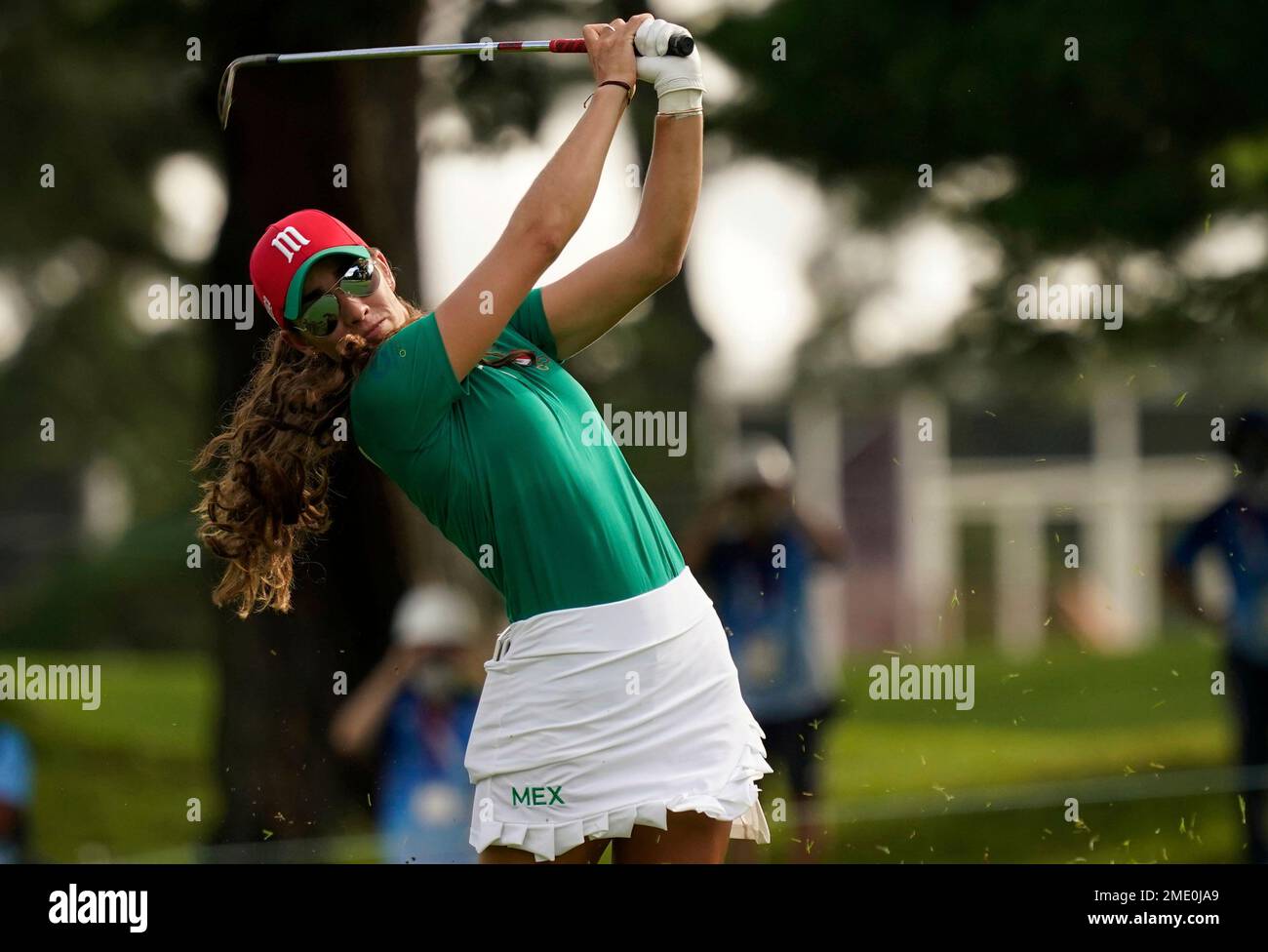 Maria Fassi, of Mexico, plays a shot from the first fairway during the ...