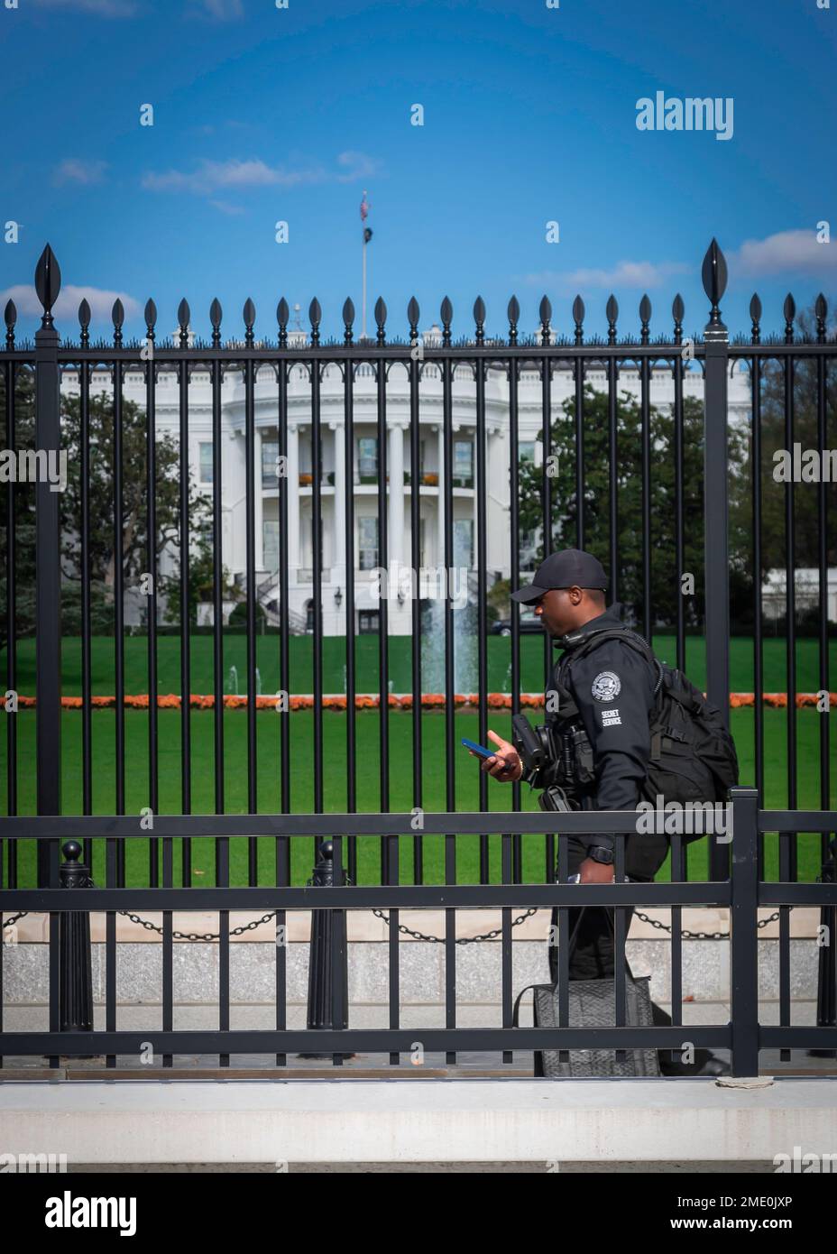 Security detail outside the White House grounds in Washington, D.C ...