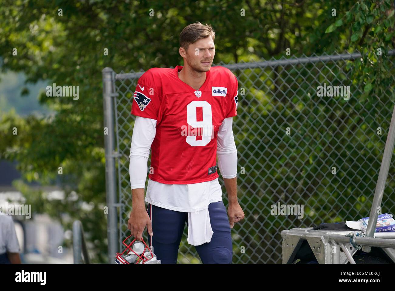 New England Patriots quarterback Jake Dolegala steps on the field at the start of an NFL ...