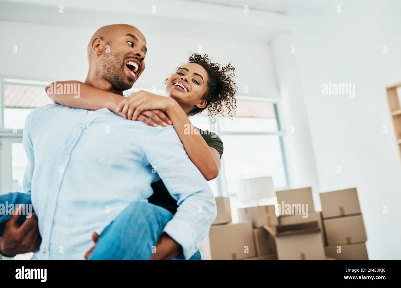 Our future together shines so brightly. a young couple having fun while ...