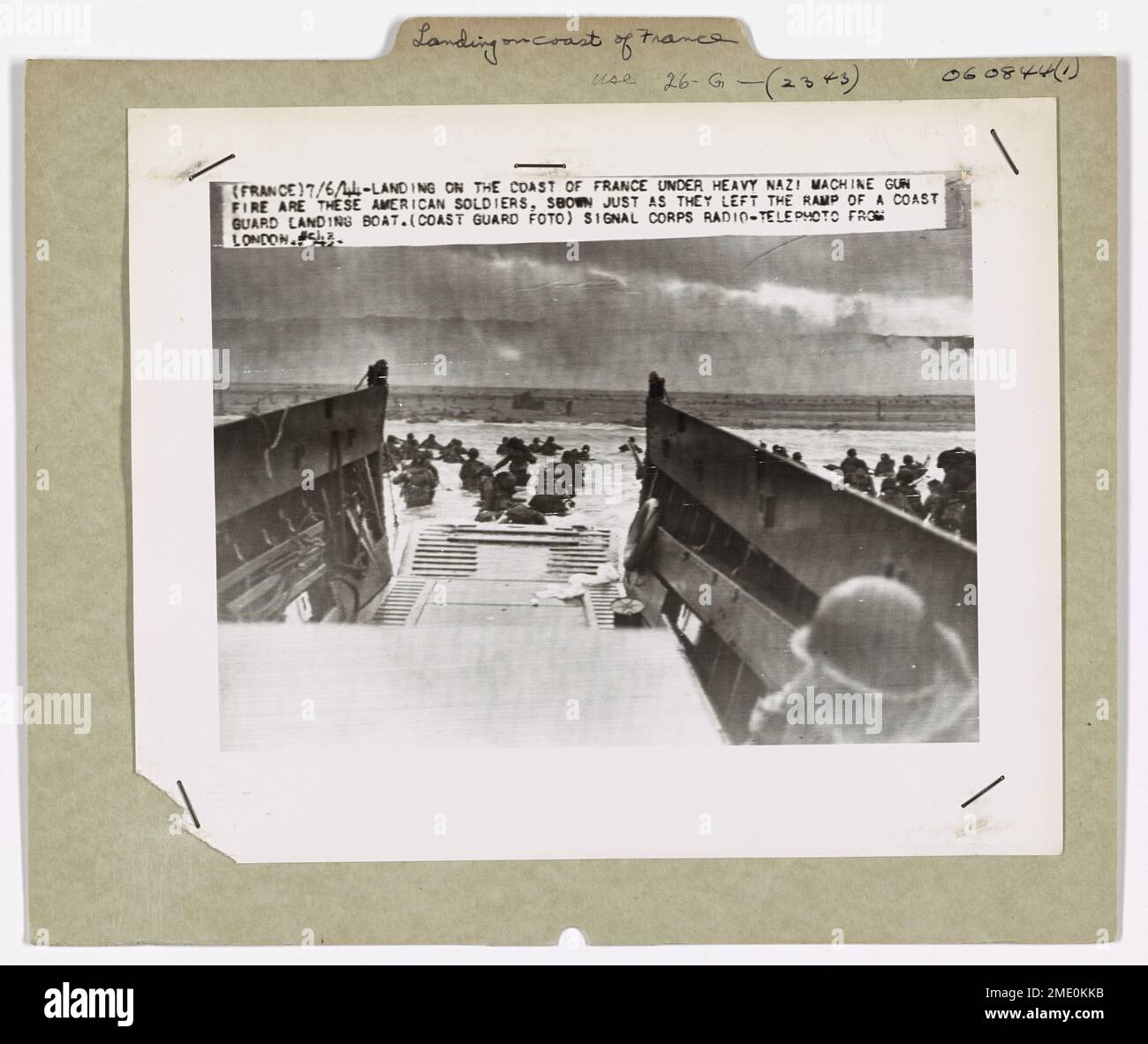 American soldiers storm the coast of France on July 6, 1944, under ...