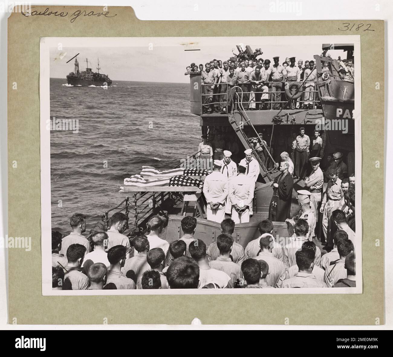 Coast Guardsmen conduct a burial at sea for two sailors who perished ...