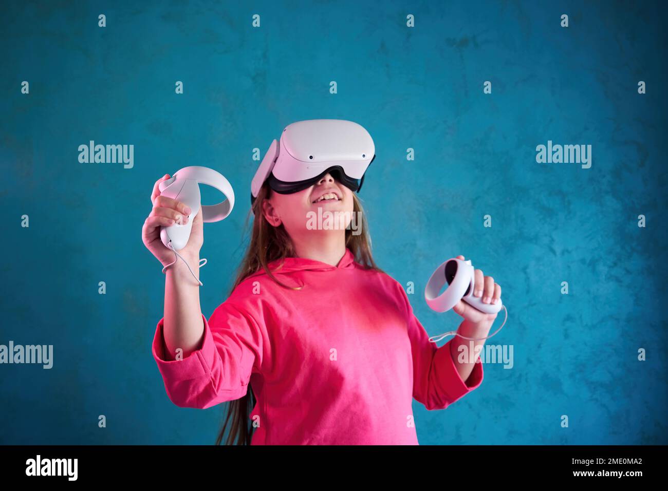 little girl playing with VR glasses Stock Photo - Alamy