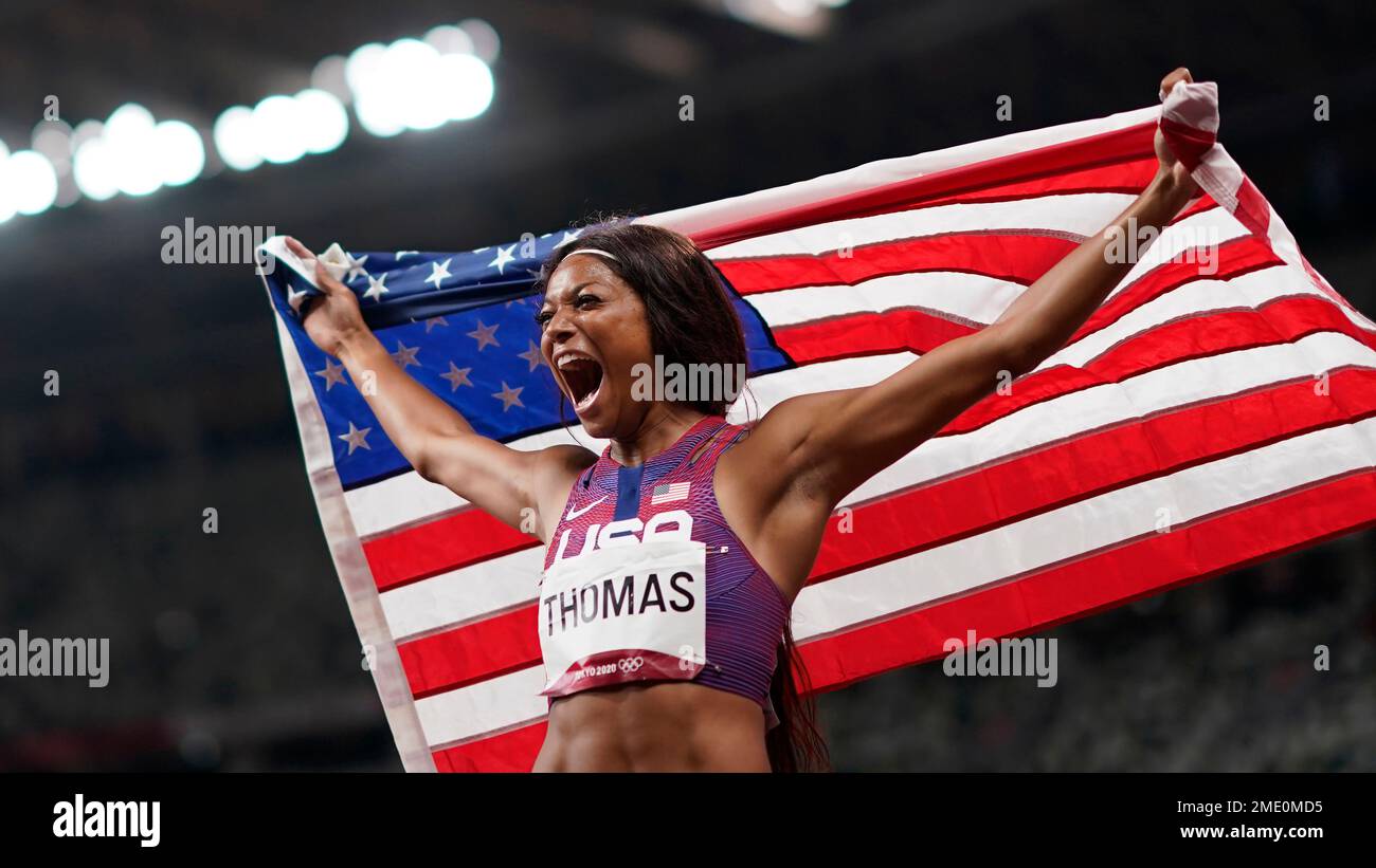 Gabrielle Thomas, of United States, reacts after her third place finish ...