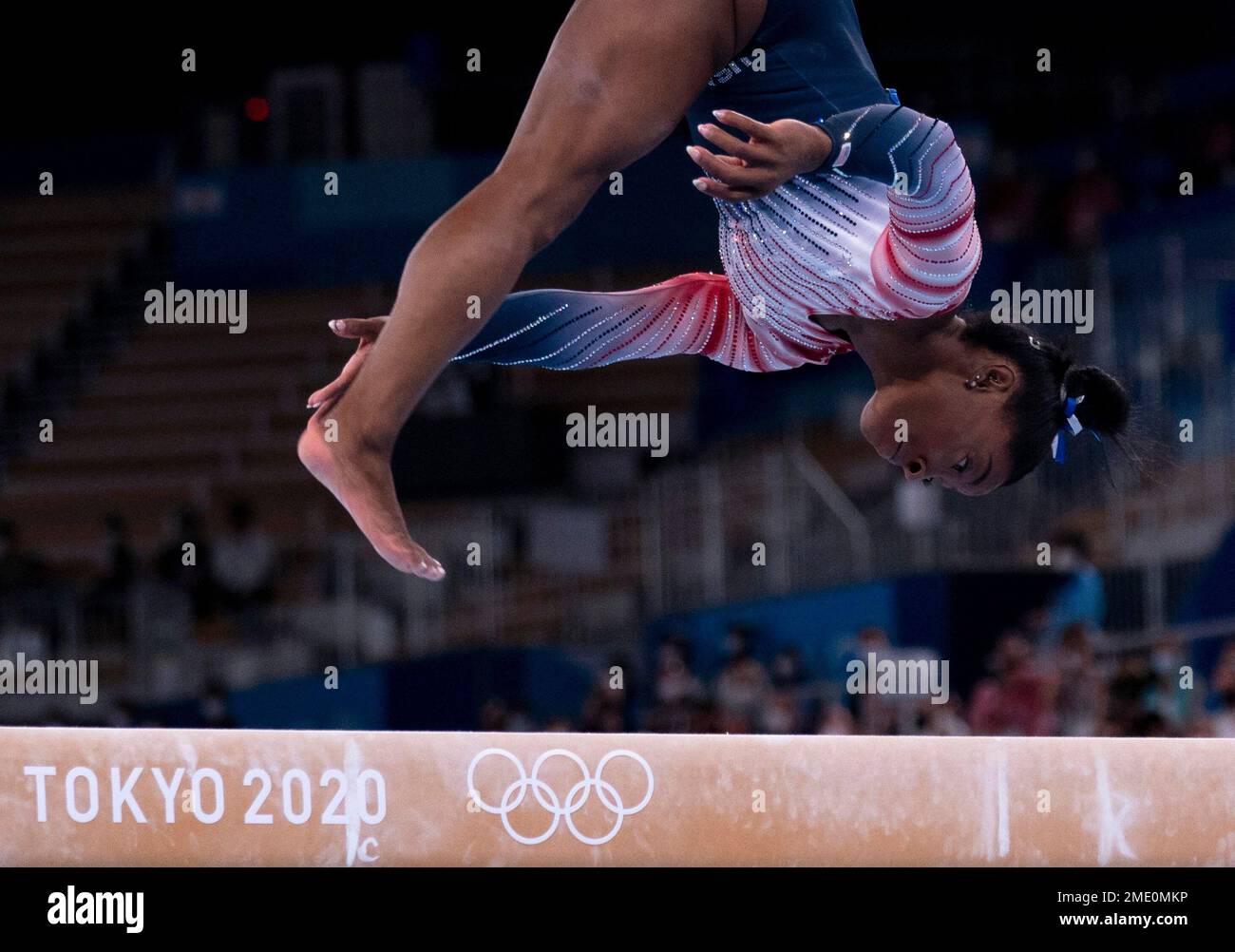 Simone Biles, from the United States, competes in the balance beam ...