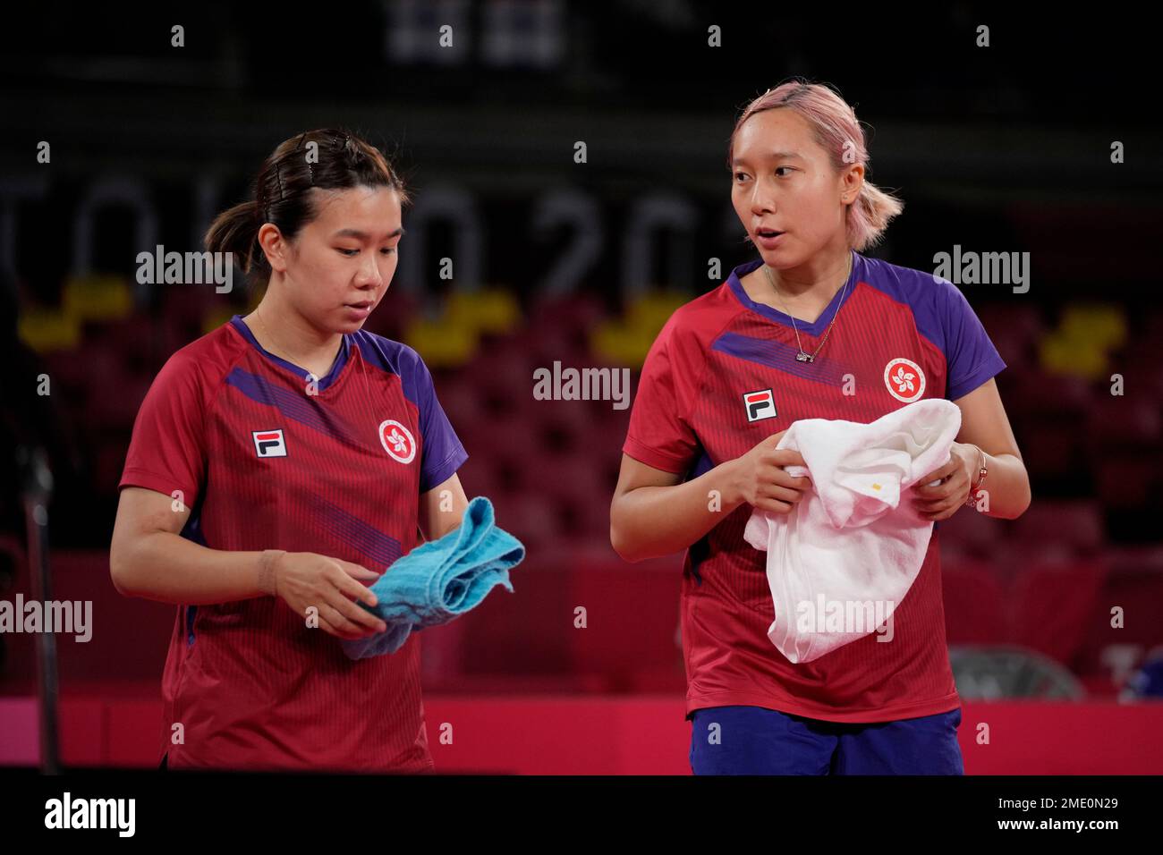 Hong Kong's Minnie Soo Wai-yam, right, and Lee Ho-ching gesture during ...
