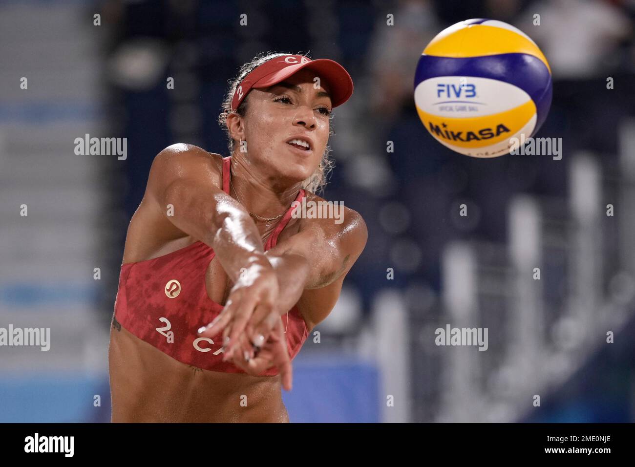 Brandie Wilkerson, of Canada, returns a shot during a women's beach ...