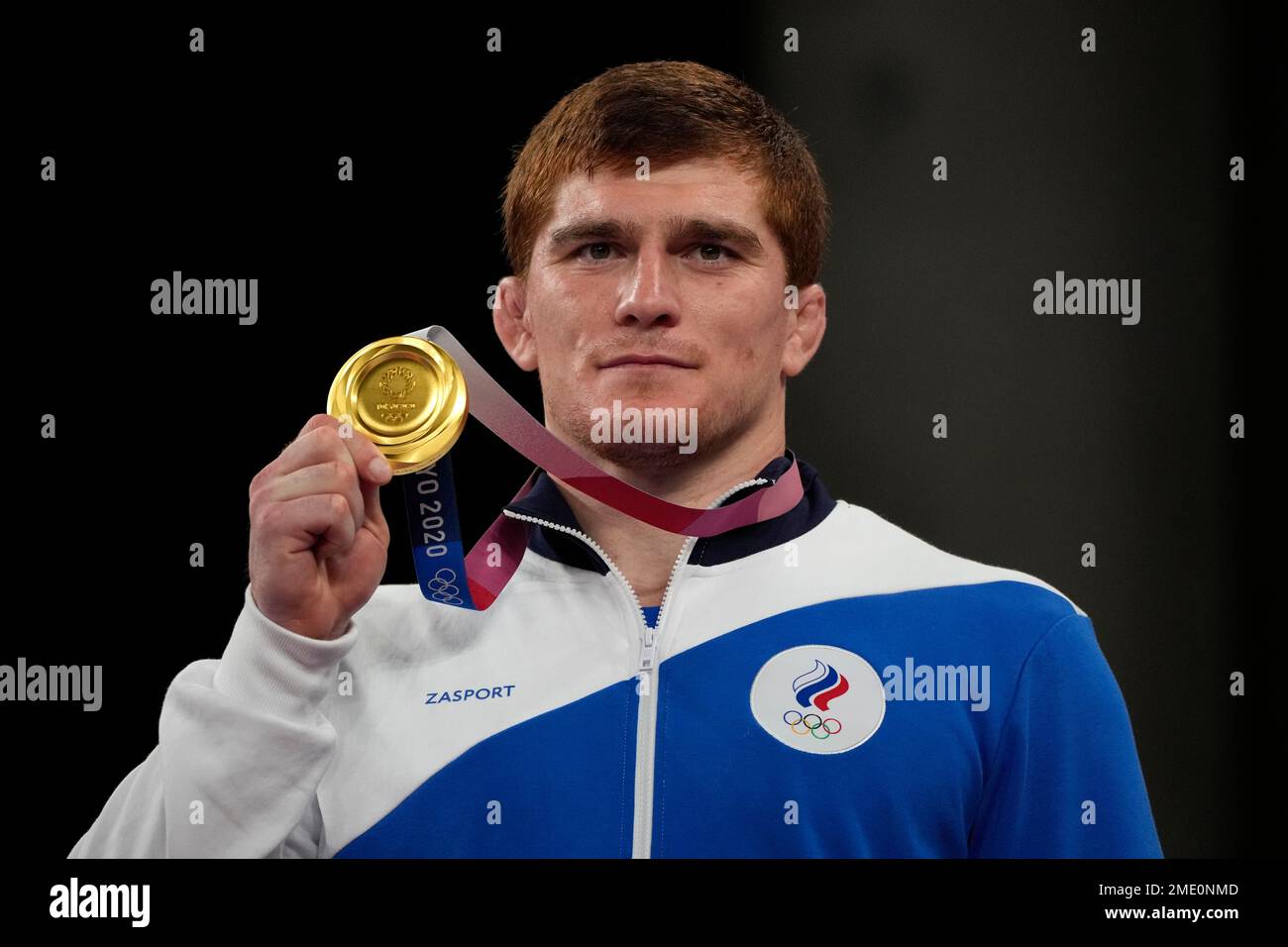 Gold medalist, Russian Olympic Committee's Evloev Musa celebrates on ...