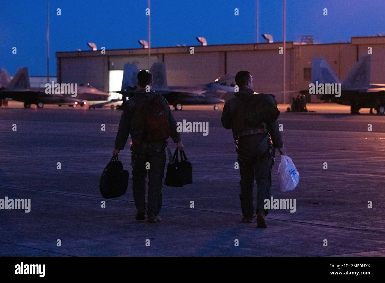 U.S. Air Force F-22 Raptor pilots from the 90th Fighter Squadron, 3rd ...