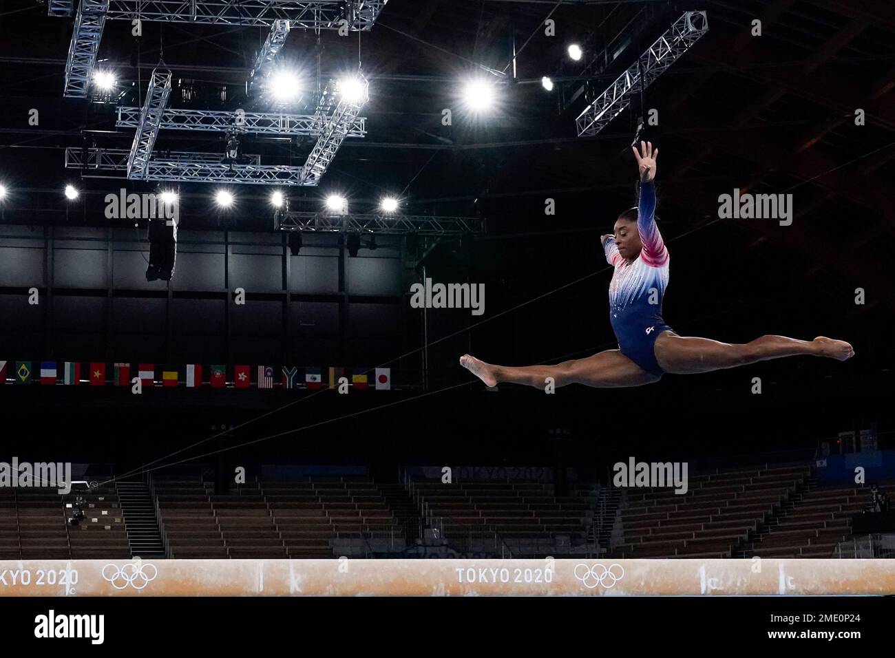 Simone Biles, of the United States, performs on the balance beam during ...