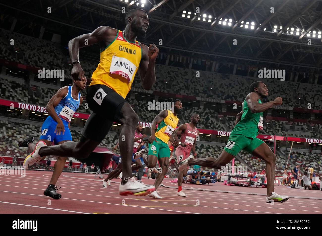 Joseph Amoah, of Ghana, competes in a semifinal of the men's 200-meters ...