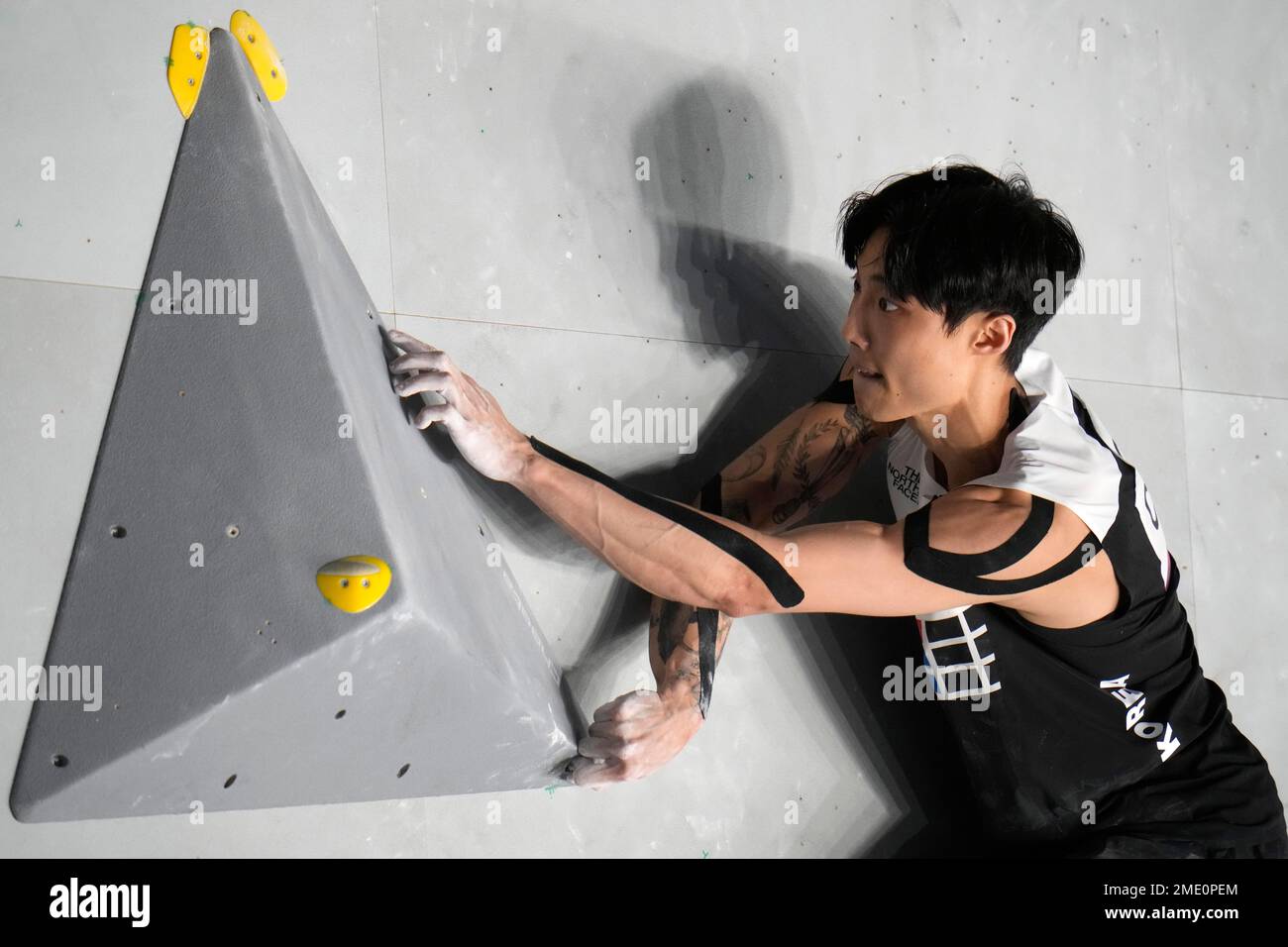 Chon Jong-won, of South Korea, participates during the bouldering ...