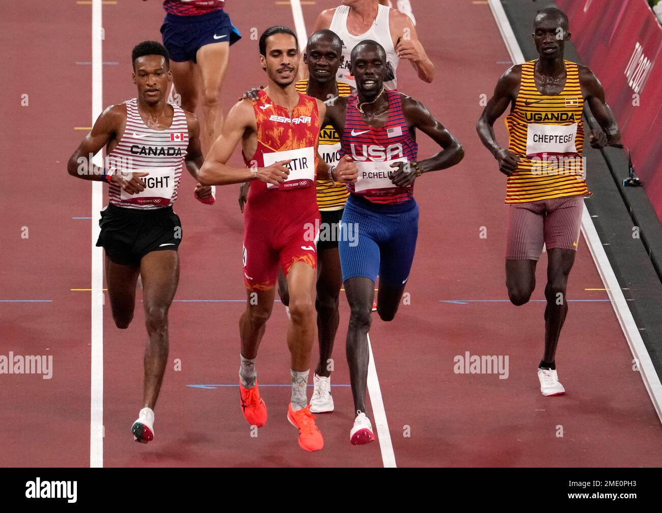 Mohamed Katir, of Spain and Paul Chelimo, of United States embrace each ...