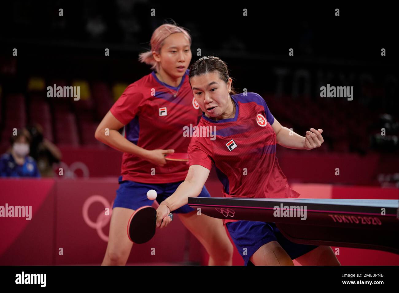 Hong Kong's Minnie Soo Wai-yam, left, and Lee Ho-ching compete during ...