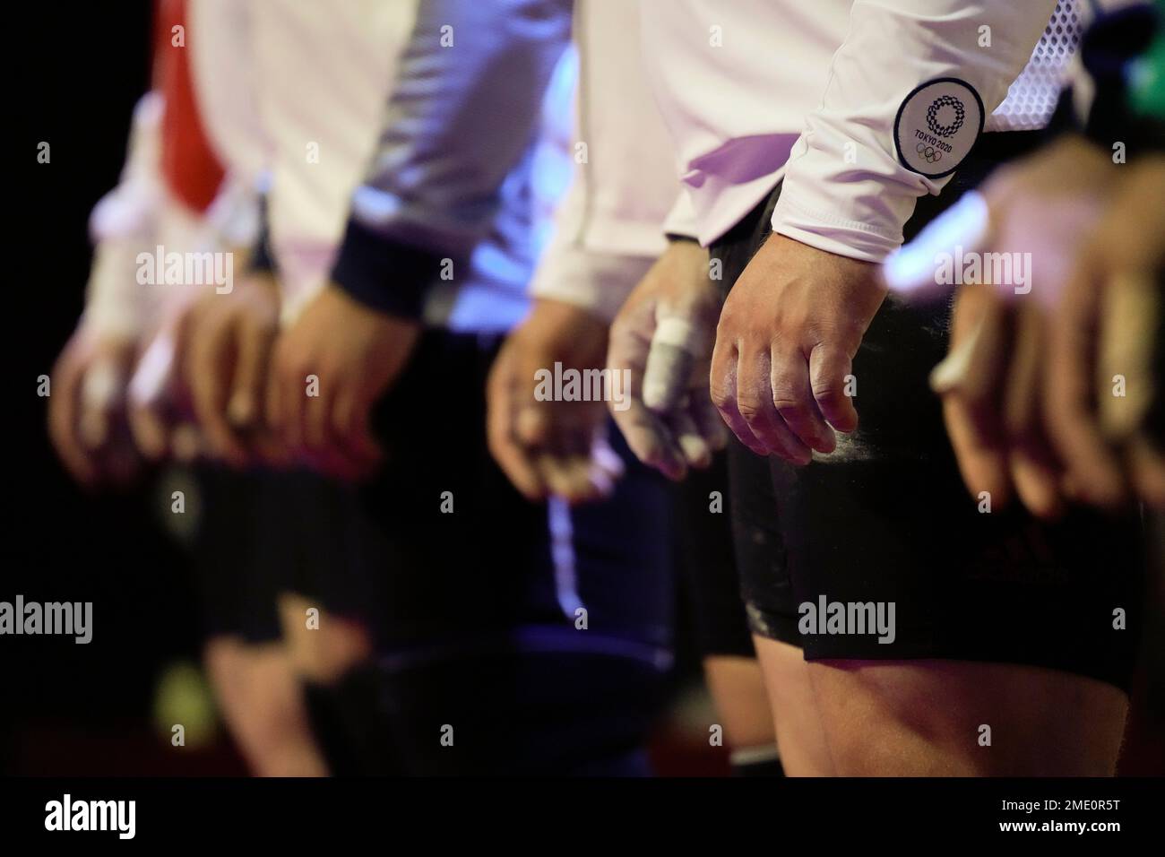 Athletes line up to be introduced at the start of the men's 109kg ...