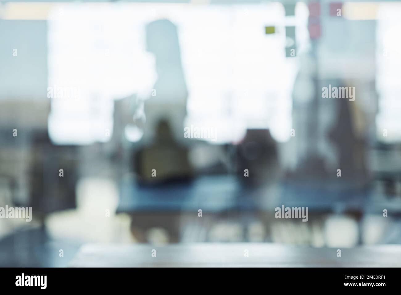 Reflection, glass and shadow of person in window while working at a ...