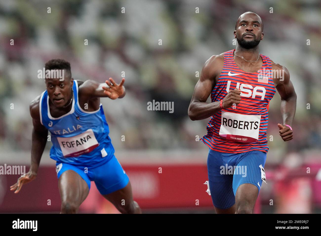 Daniel Roberts, of United States competes with Hassane Fofana, of Italy ...
