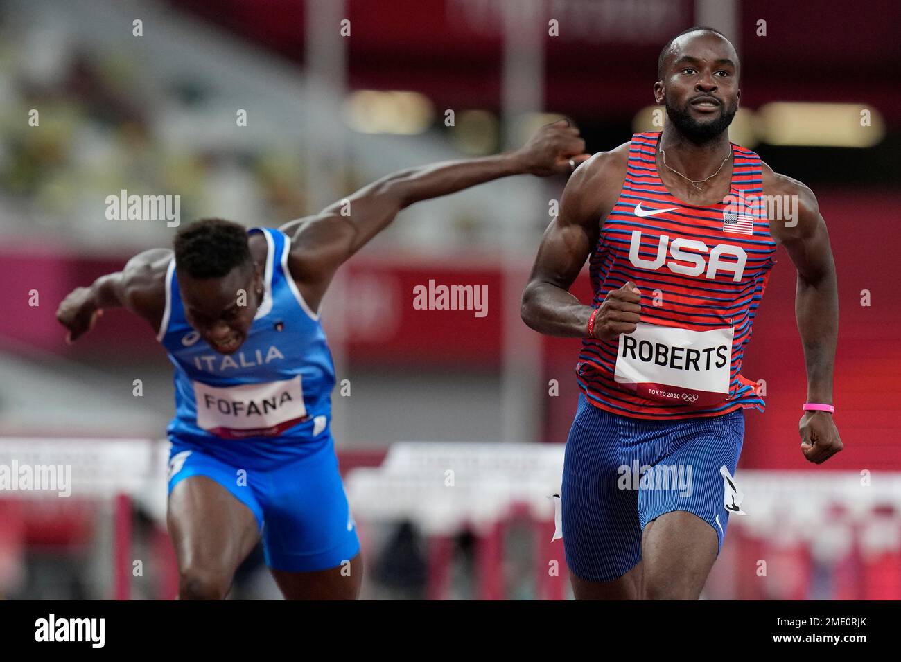 Daniel Roberts, of United States, competes in a heat of the men's 110 ...