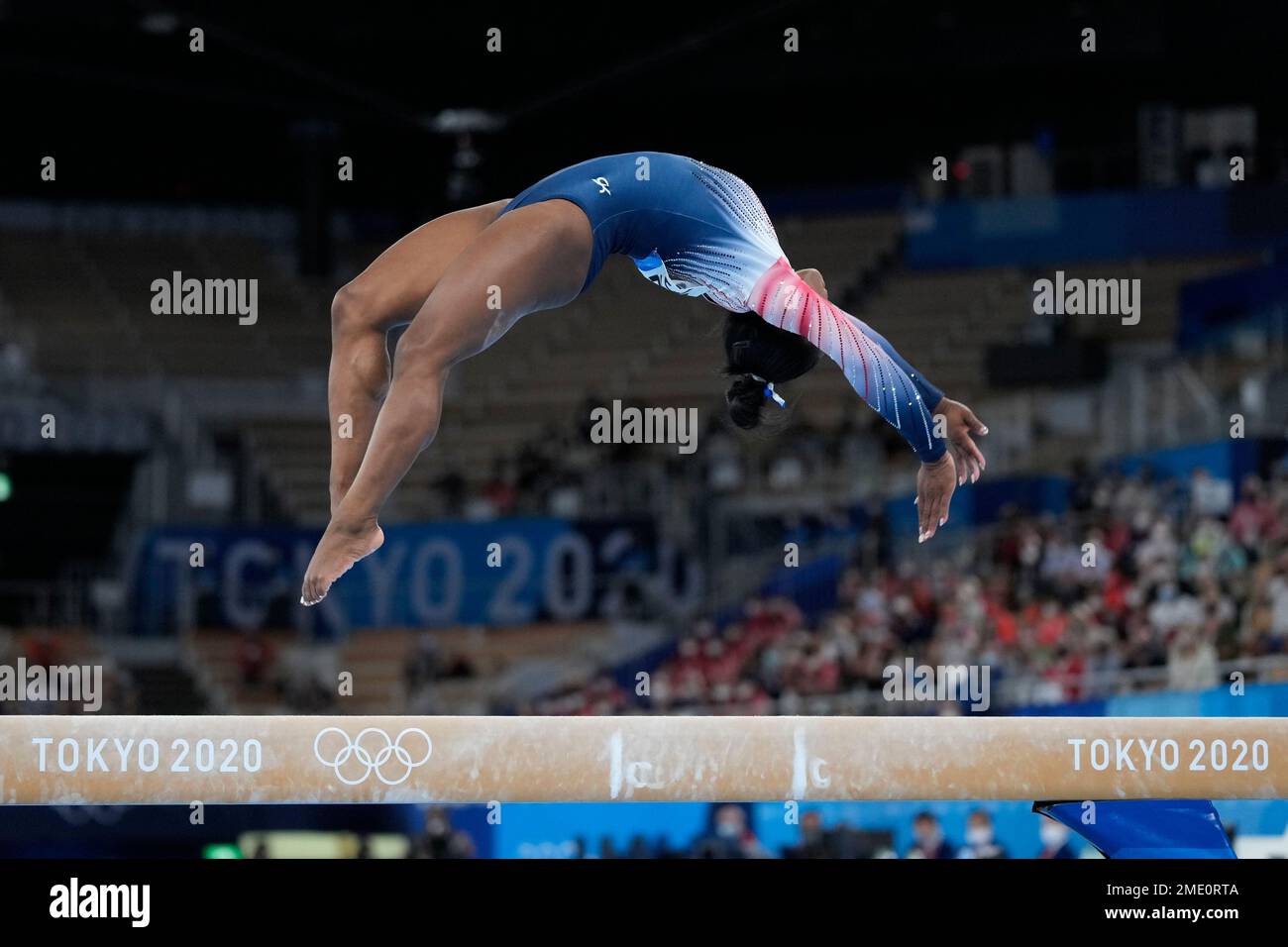 Simone Biles, of the United States, performs on the balance beam during ...