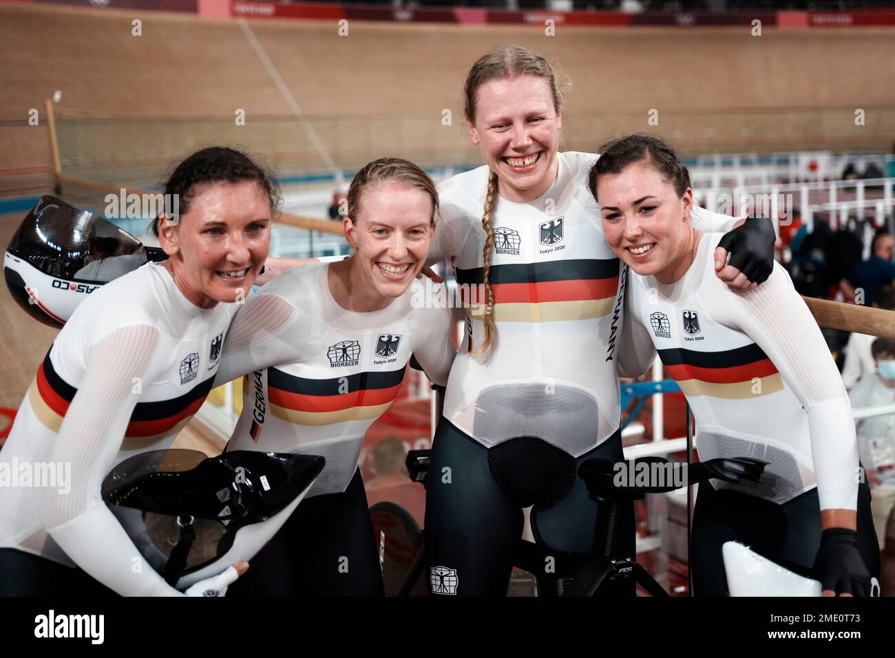 Team Germany celebrates after winning the gold medal and setting a ...